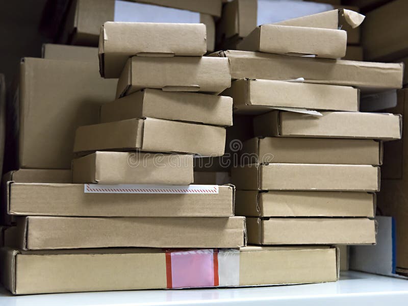 Stack of Small Cardboard Boxes on a Shelf Stock Image - Image of ...