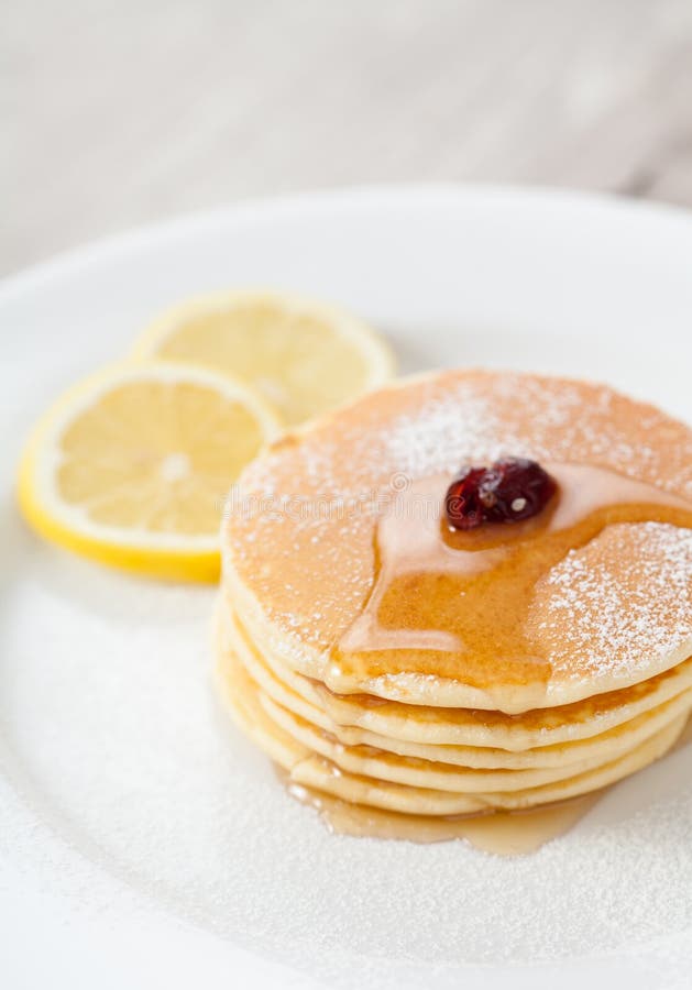 Stack of Small Pancakes with Honey and Lemon Stock Image - Image of ...