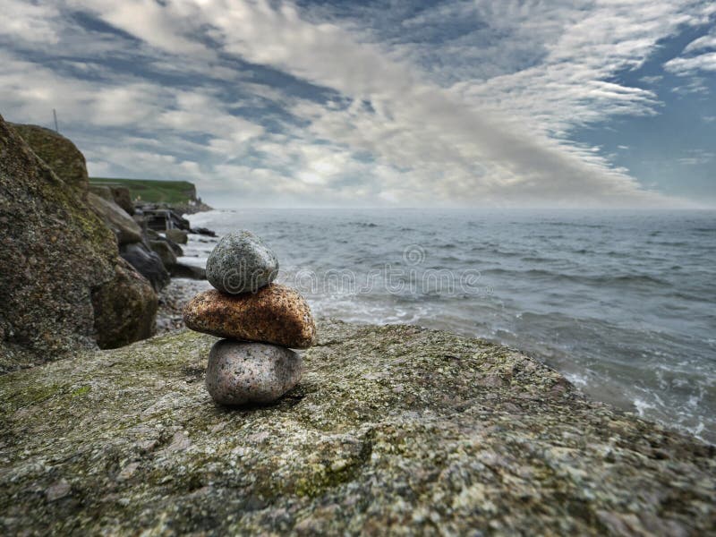 Stack of Small Rocks on a Big Stone, Beautiful Ocean Scene in the ...