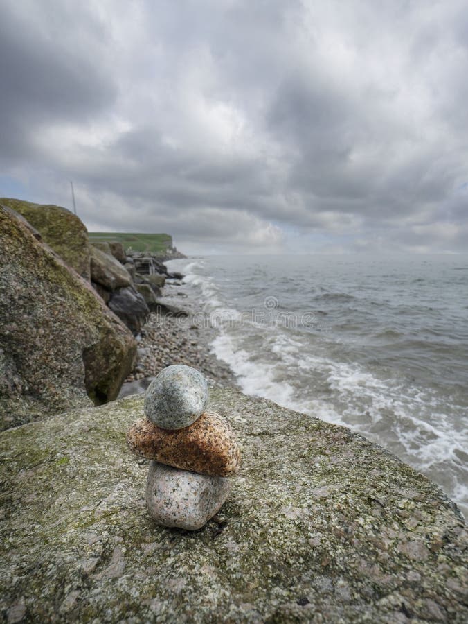 Stack of Small Rocks on a Big Stone, Beautiful Ocean Scene in the ...