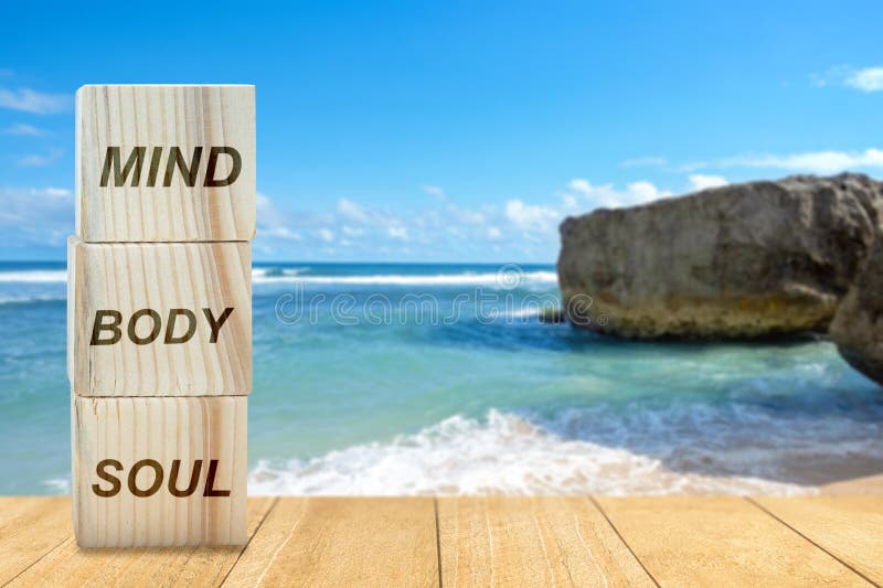 Stack of Small Wooden Cubes with the Text of Mind, Body, and Soul on ...