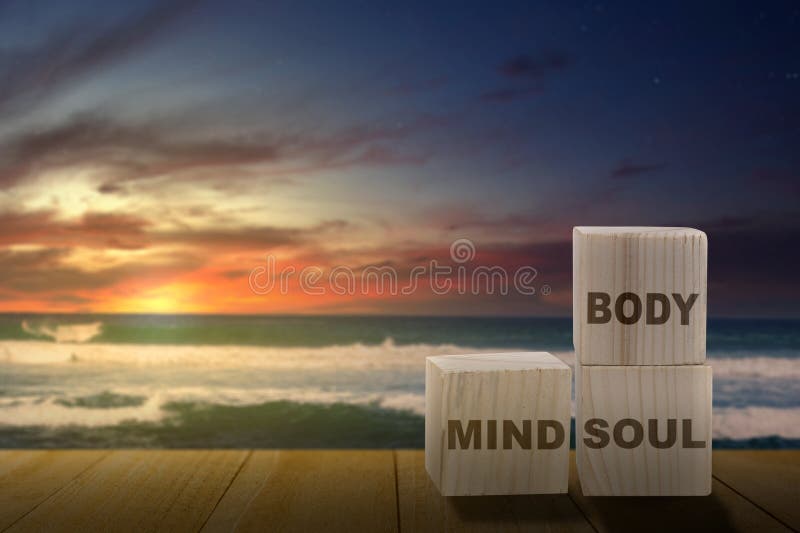 Stack of Small Wooden Cubes with the Text of Mind, Body, and Soul on ...