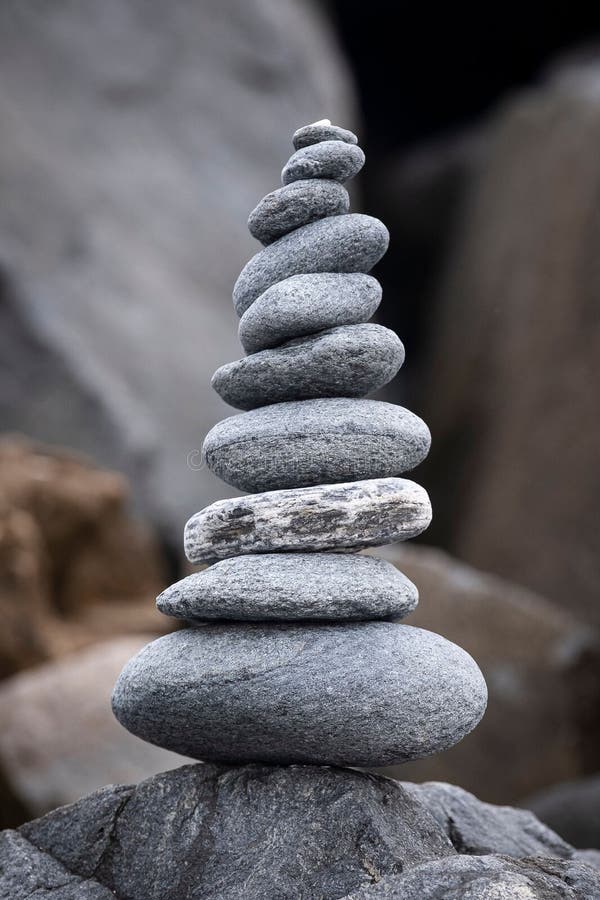 Stack of Smooth Stones Balanced on Top of a Rocky Surface Stock Image ...