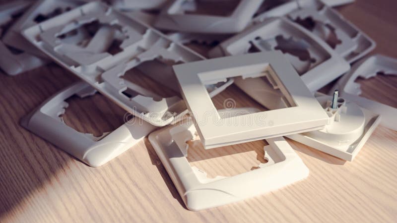 The Stack of Socket Frames on the Light Wooden Table Stock Photo ...