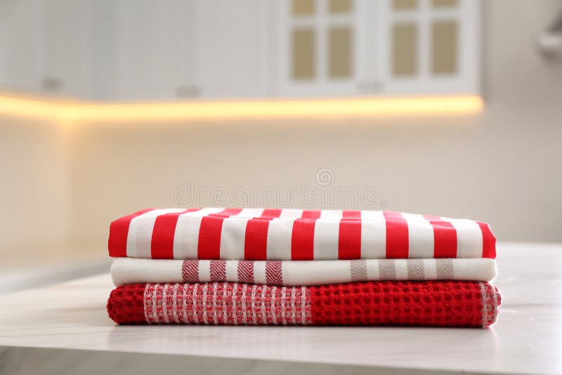 Stack of Soft Kitchen Towels on White Table Indoors Stock Photo - Image ...