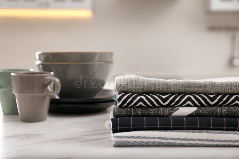 Stack of Soft Kitchen Towels on White Table Indoors, Space for Text ...