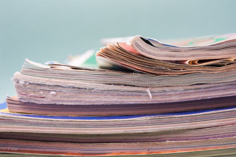 A Stack of Soiled Sheets of Old Magazines. Stock Photo - Image of waste ...
