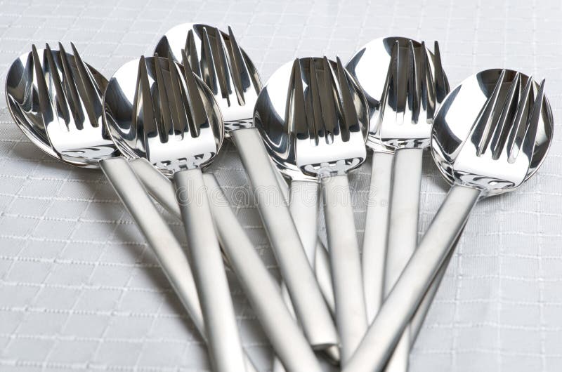 Spoons in a row stock image. Image of tablecloth, spoon - 21933801