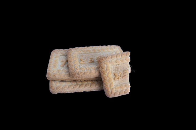 Stack of Square Biscuits with a Broken Piece on Black Background Stock ...