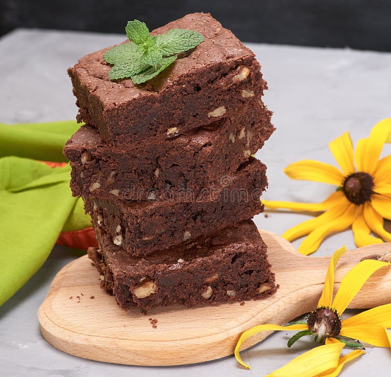 Stack of Square Pieces of Chocolate Brownie Cake with Walnuts Stock ...