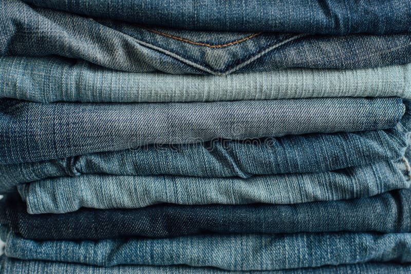 Stack of a Stack of Old Jeans Various Shades of Blue Jeans. Denim Jeans ...