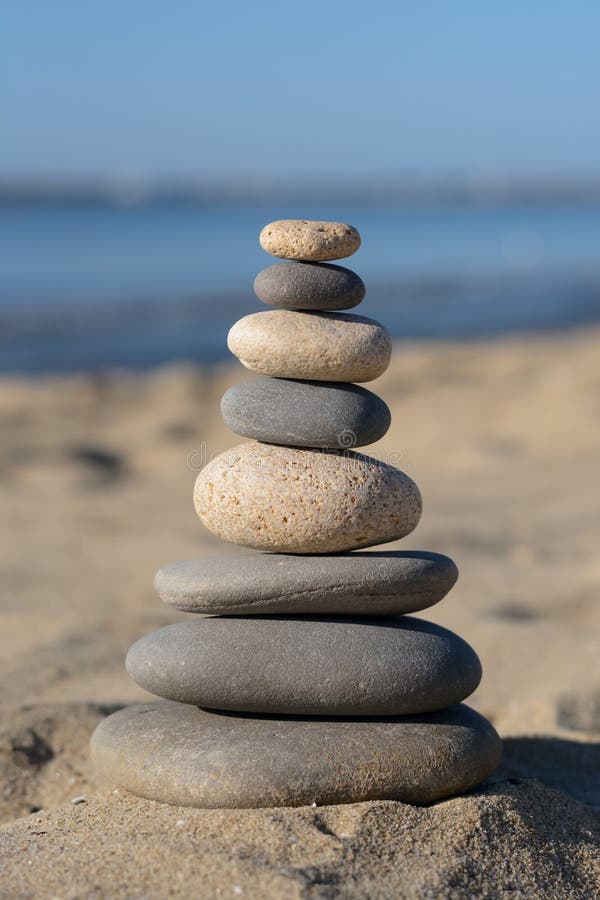 Stack of Stones on Beautiful Sandy Beach Stock Image - Image of simple ...