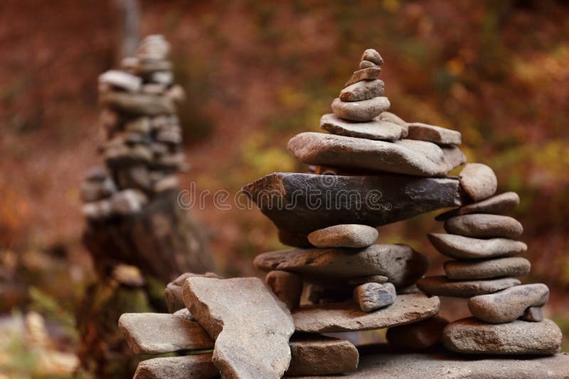 Stack of stones in forest. stock image. Image of pebble - 136552809