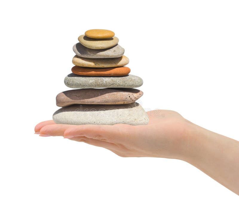 Stack of stones in hand stock photo. Image of group, hand - 47118824