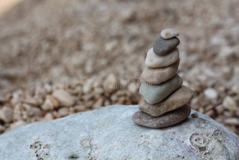 A Stack of Stones Pebbles Balance on a Large Stone Stock Image - Image ...
