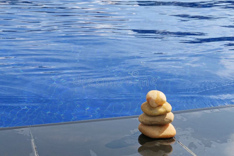 Stack of Stones on Pool Edge Stock Image - Image of stack, relaxation ...