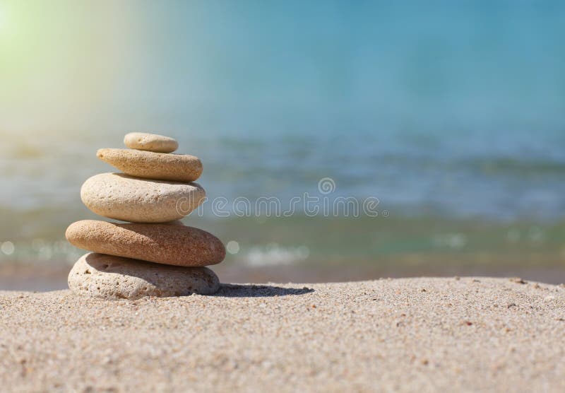 Stack of stones on sand stock image. Image of beach, sand - 40379681
