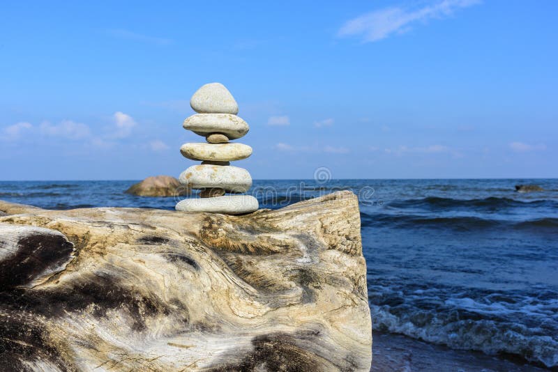 Stack of stones on stump stock photo. Image of meditation - 62027112