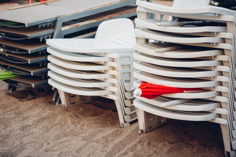 Stack of Sun Loungers at the End of a Summer Day Stock Photo - Image of ...