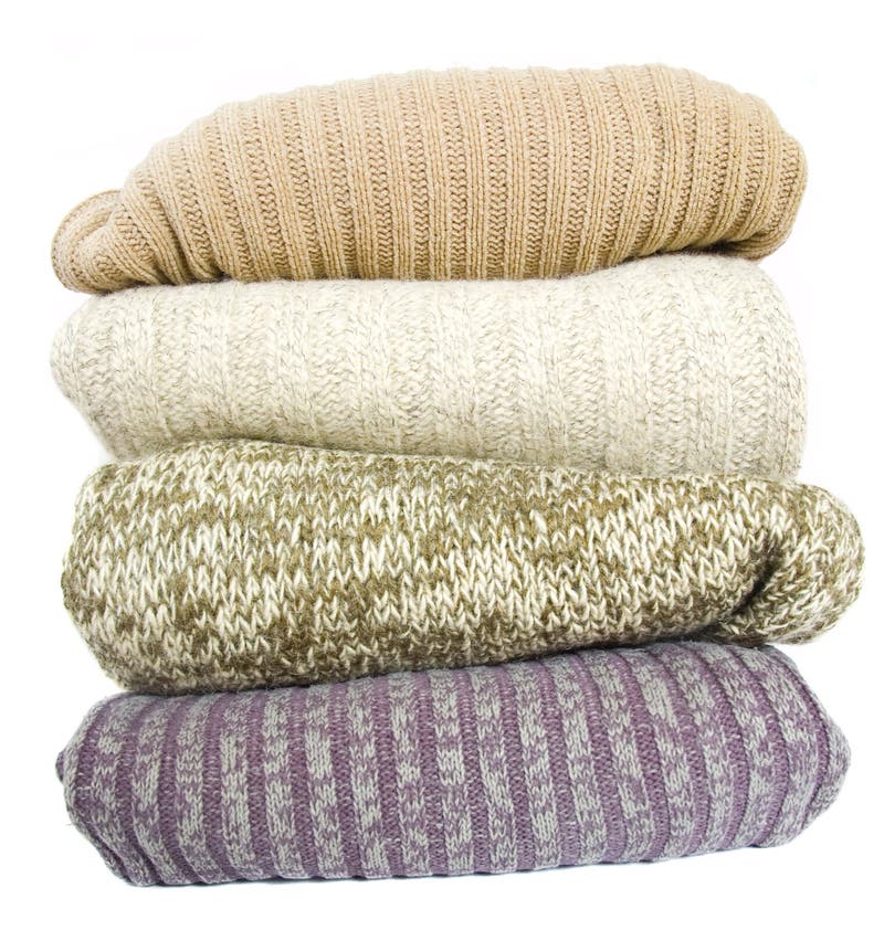 Stack of sweaters stock photo. Image of isolated, garment - 27799608