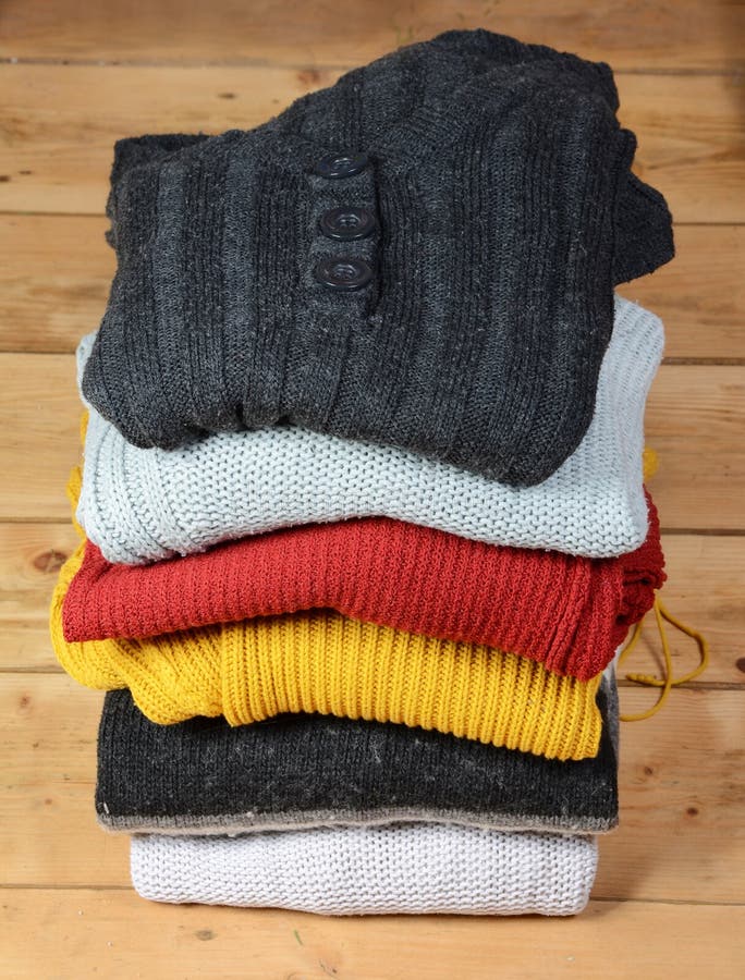 Stack of sweaters stock photo. Image of colors, white - 37443308