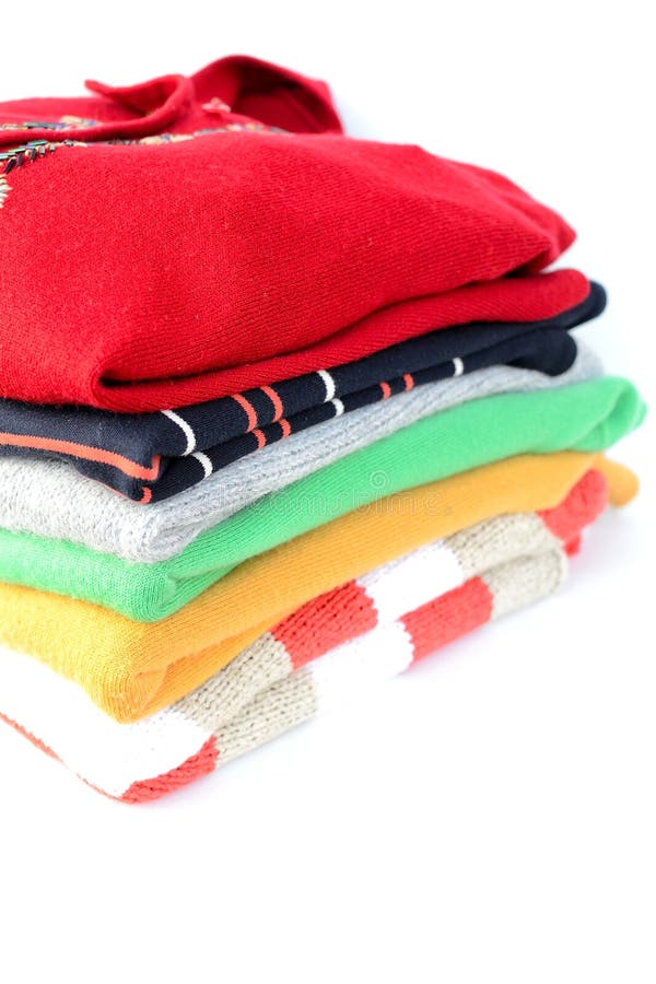 Stack of sweaters stock photo. Image of clothes, pile - 54297604