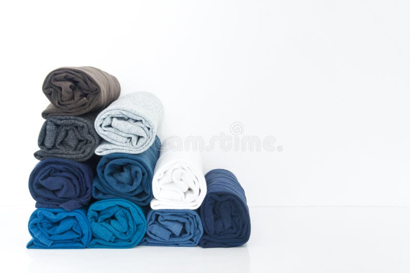 Stack of T-shirt Rolled Up on White Background Stock Image - Image of ...