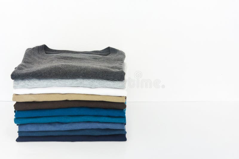 Stack Pile Folded Cotton Clothes On White. Stock Photo - Image of color ...