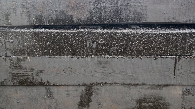 Stack of Tarred Timbers, Old Railway Sleepers, with Smudges of Tar on ...