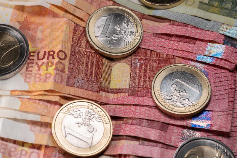 Stack of Ten Euro Banknotes, Euro Coins on Red 10 Euro Bills Stock ...