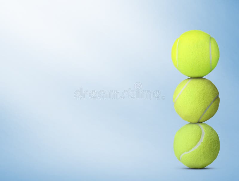 Stack of Tennis Balls on Light Blue Background. Space for Text Stock ...