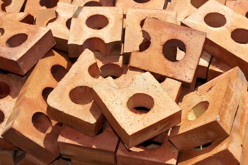 Stack of Terracotta Bricks in the Sun Stock Photo - Image of perfect ...