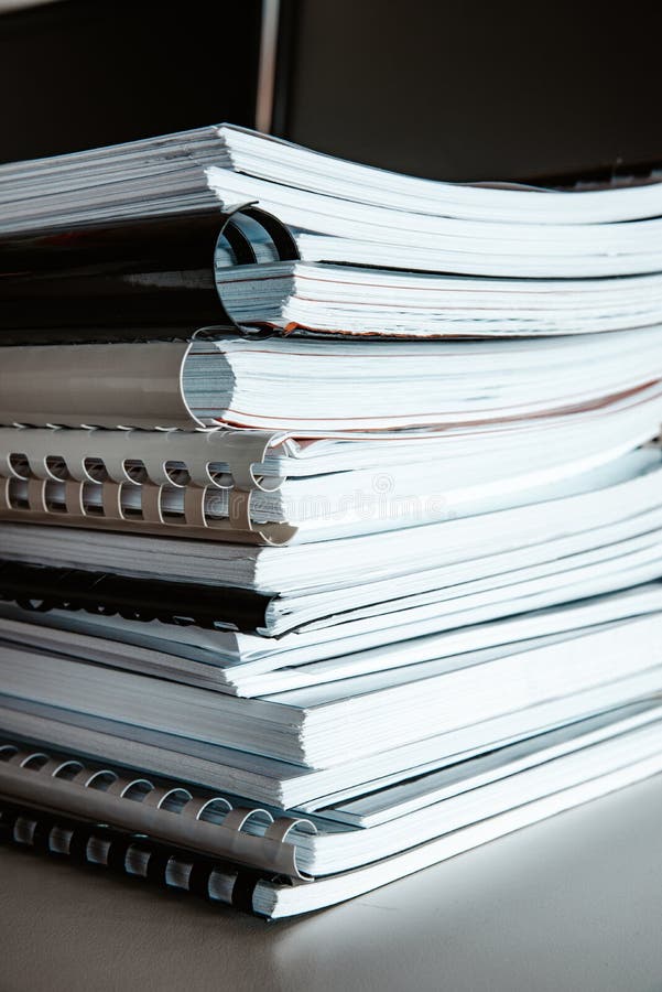 Stack of Reports Lies on a Desk Ready for Review Stock Image - Image of ...