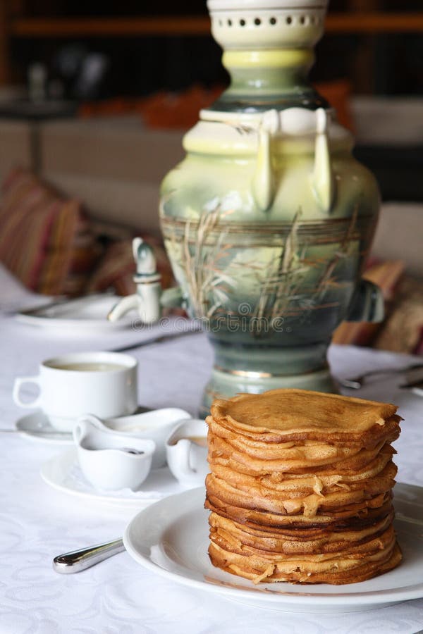 Stack of Thin Crepes with Tea, Sour Cream, Jam and Honey. Dish Served ...