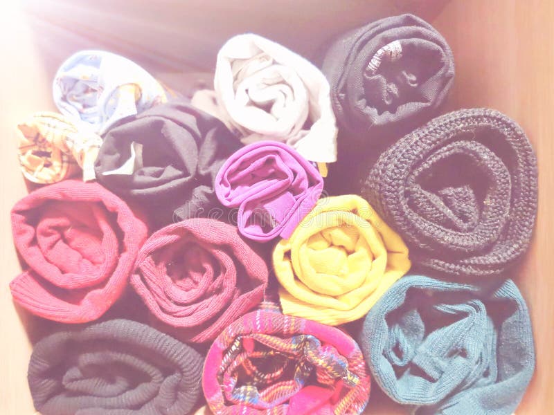 A Stack of Things Rolled Up in Rolls is in the Closet. the Concept of a ...