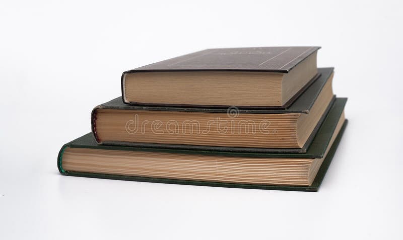 A Stack of Three Books on a White Background. Stock Image - Image of ...