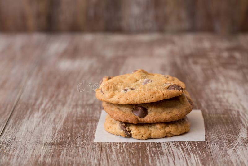 Stack of Three Chocolate Chip Cookies Stock Photo - Image of milk ...