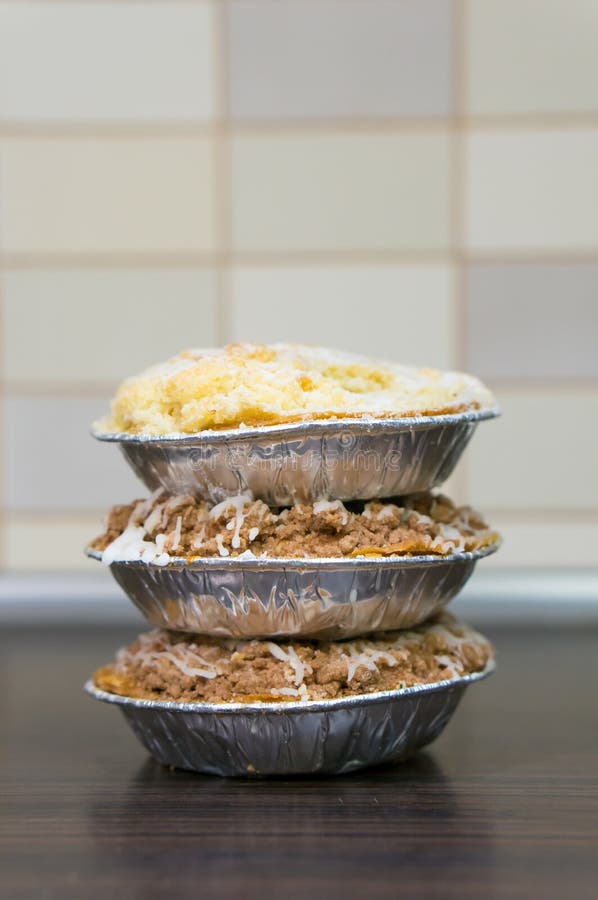 Stack of Three Different Pies on a Wooden Surface Stock Photo - Image ...