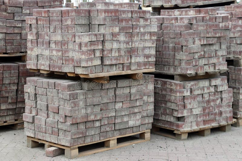 Stack of Tiles on the Sidewalk, Pavement Stones Stacked on Pallet at ...