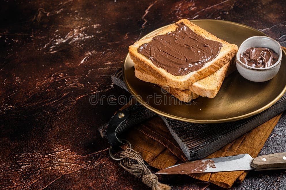 Stack of Toasts with Chocolate Hazelnut Cream in Plate. Dark Background ...