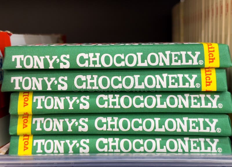 Stack of Tony S Chocolonely Milk Chocolate Bars on Shelf Editorial ...