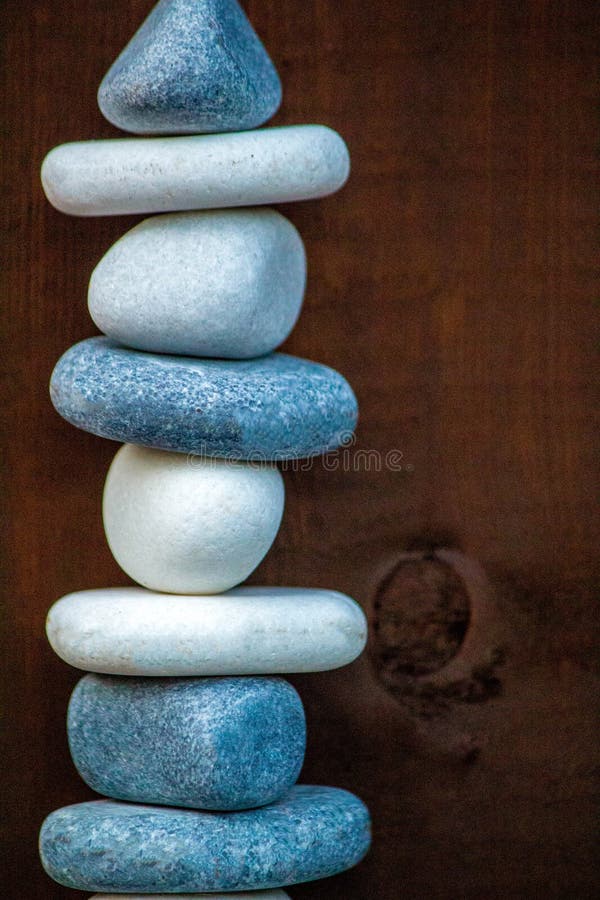 Stacked Rocks stock photo. Image of hand, stones, stacked - 121362162
