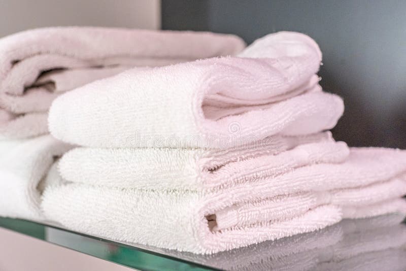 Stack of Towels in a Hotel Bathroom Stock Image - Image of mirror ...