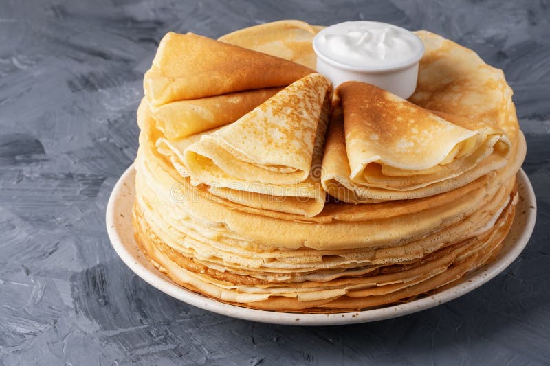 Stack of Traditional Russian Pancakes Blini on a White Table. Homemade ...