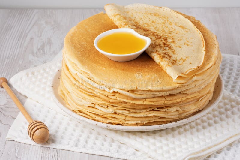 Stack of Traditional Russian Pancakes Blini on a White Table. Homemade ...
