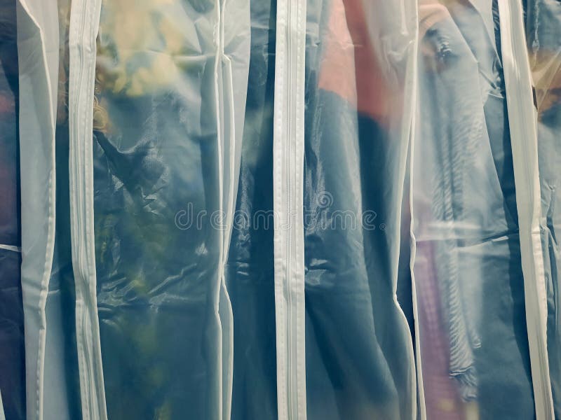 Stack of Transparent Clothes Covers Hanging on the Clothesline. Stock ...