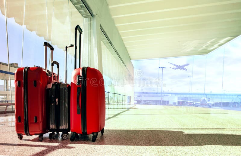 Stack of Traveling Luggage in Airport Terminal Building with Passenger ...