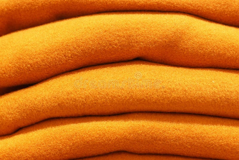 Stack of Trend Dark Cheddar Sweaters Close-up, Texture, Background ...