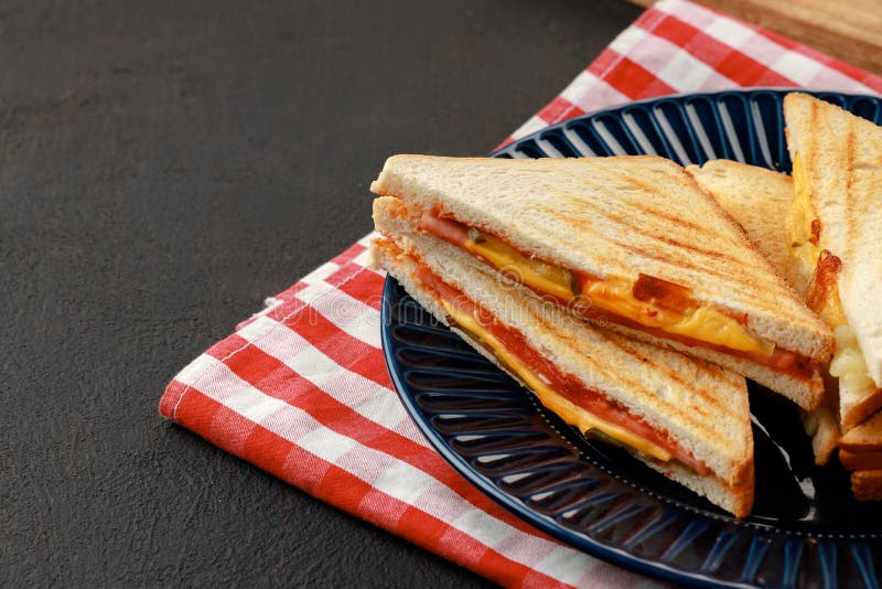 Stack of Triangle Sandwiches in Plate Close Up Stock Photo - Image of ...