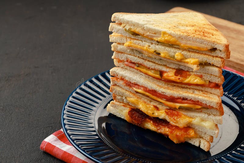 Stack of Triangle Sandwiches in Plate Close Up Stock Photo - Image of ...